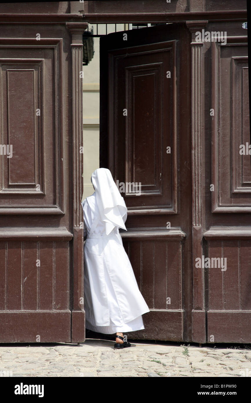 Nun large door Stock Photo - Alamy