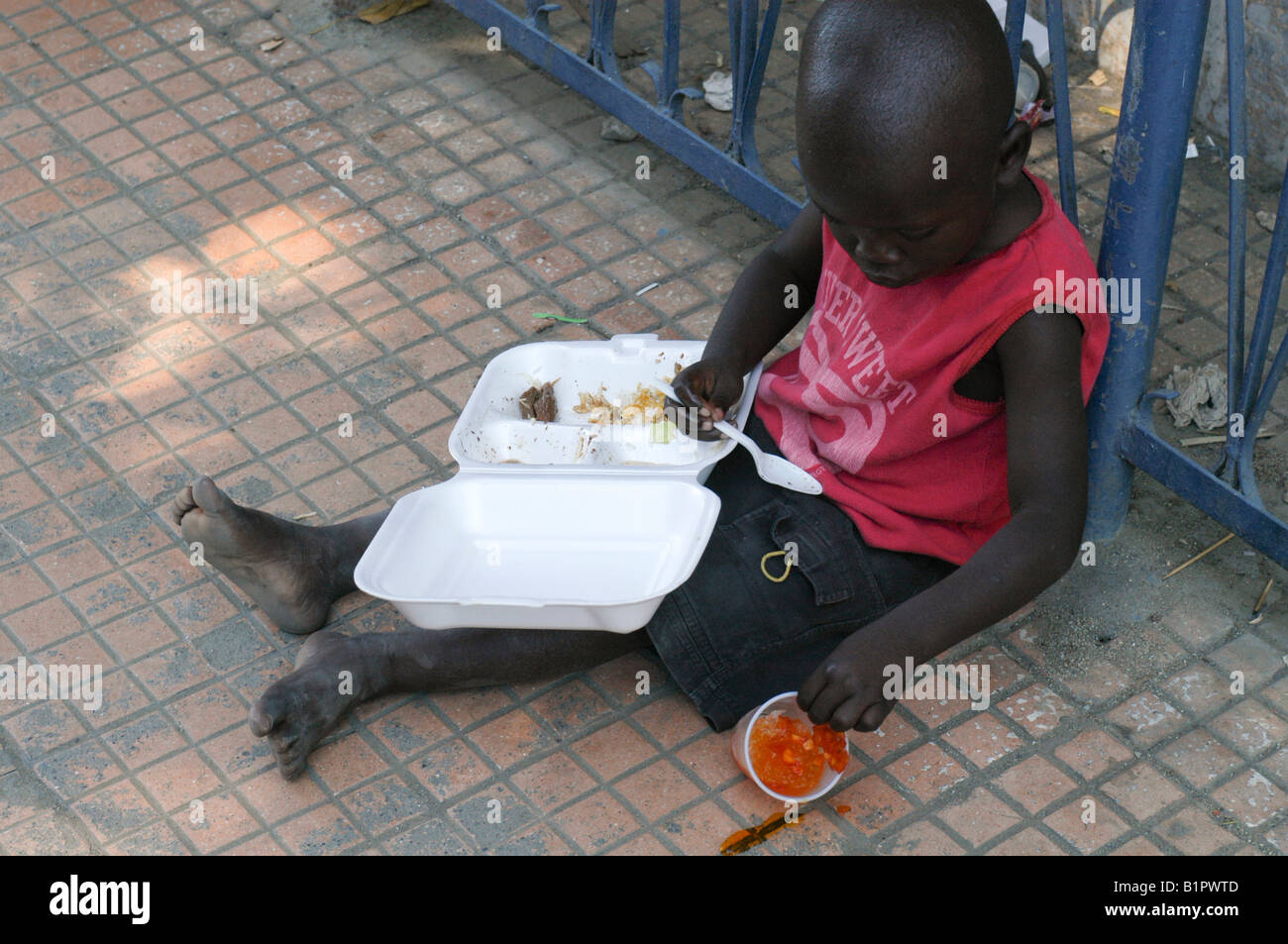 Poor child caribbean hi-res stock photography and images - Alamy