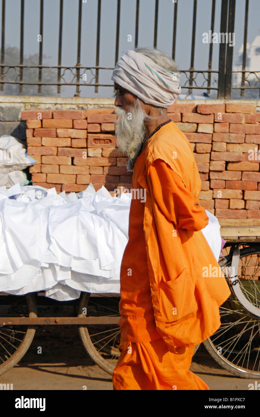 Holy man on street, New Delhi India Stock Photo - Alamy
