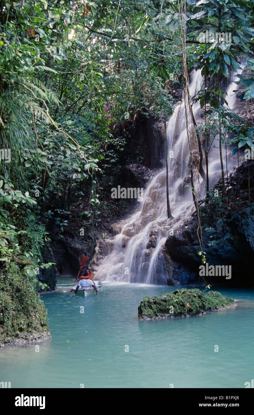 Tourists taking boat tour into falls Somerset Falls Port Antonio ...