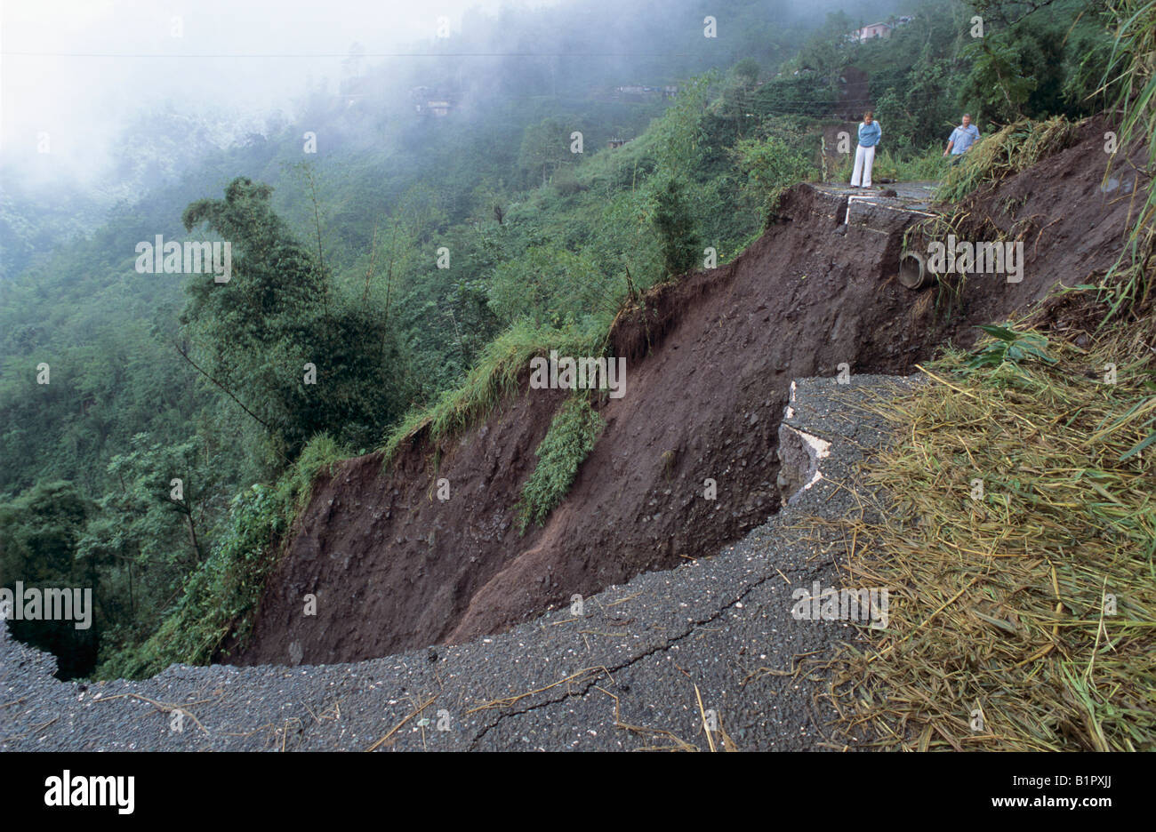 Tourists look at Road washout after Mud slide Blue Mountains Jamaica ...