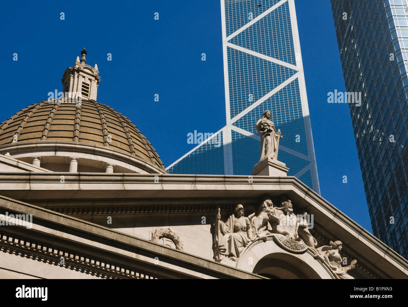 Themis the Goddess of Justice stands over the entrance of the ...