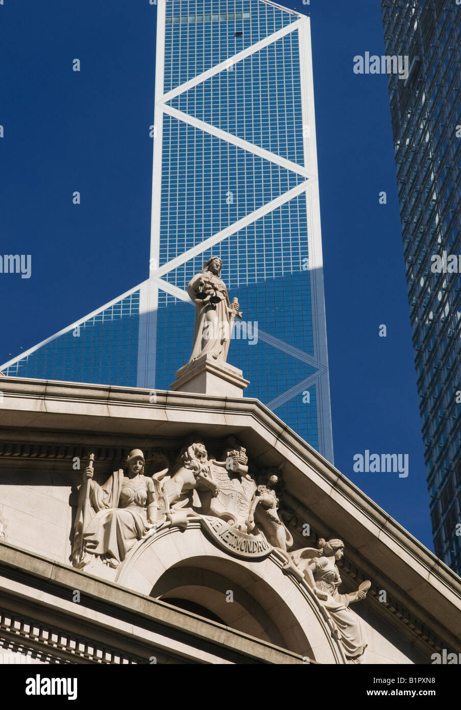 Themis the Goddess of Justice stands over the entrance of the ...