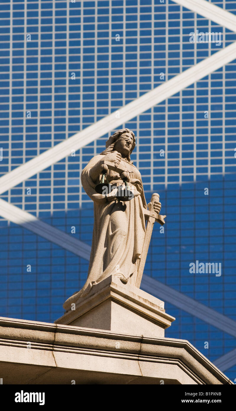 Themis the Goddess of Justice stands over the entrance of the ...