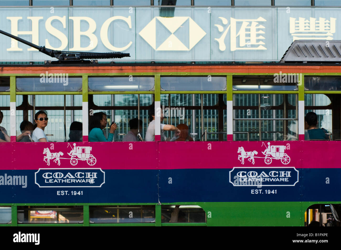 A Hong Kong Tram advertising Coach in front of the HSBC Building, Hong ...