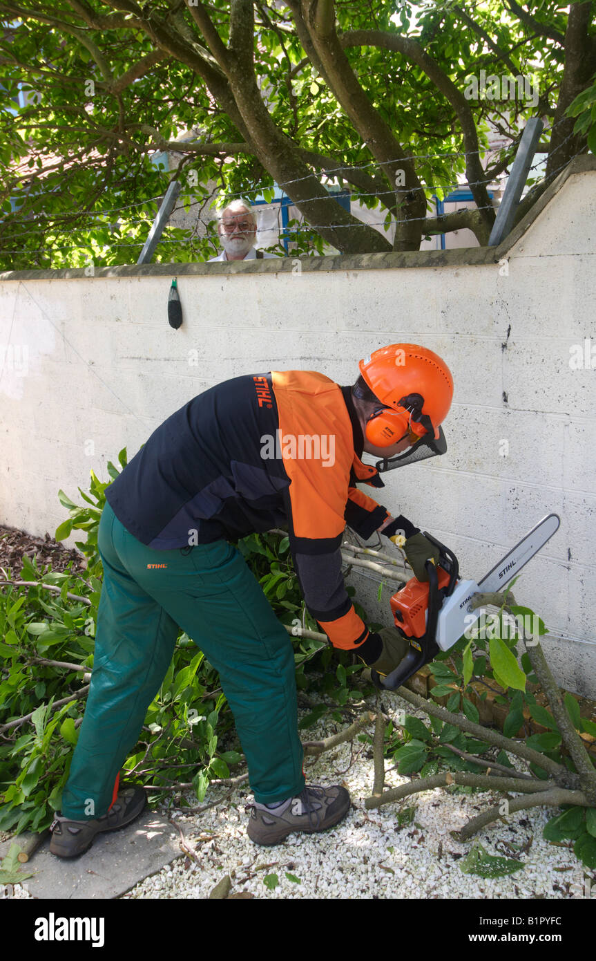 Man in full protective STIHL power tool clothing using his chainsaw MS ...