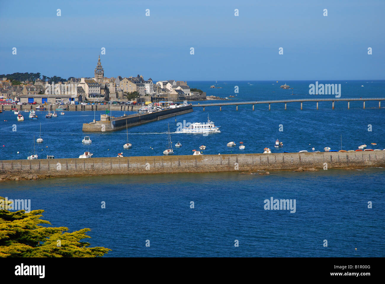 Roscoff harbour with dock jetty and sea background Stock Photo - Alamy