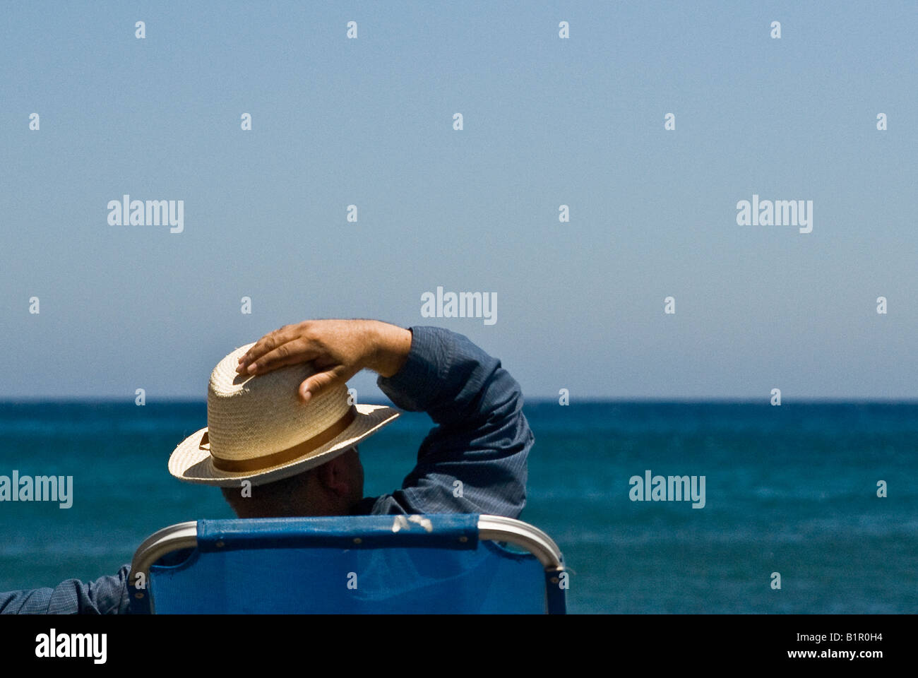 Man gazing out to sea Stock Photo - Alamy