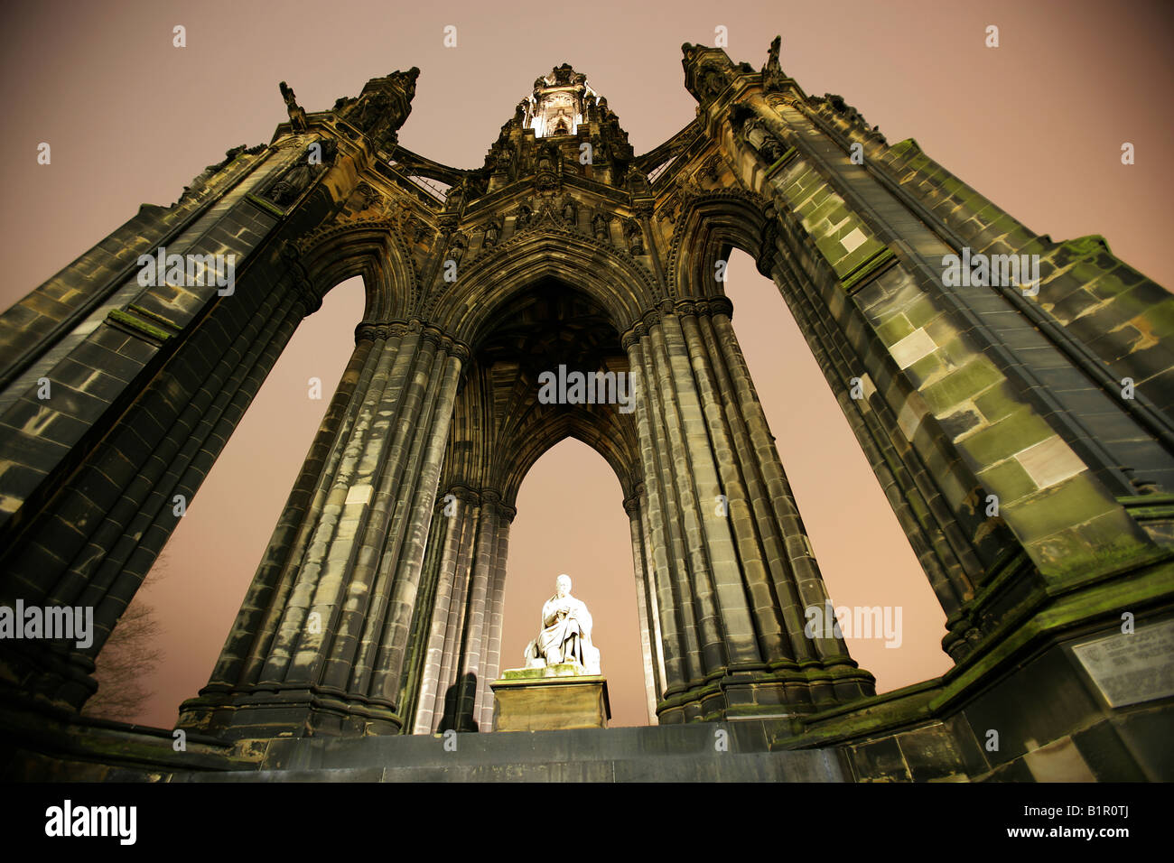 City of Edinburgh, Scotland. Night view of the Scott Monument which is ...