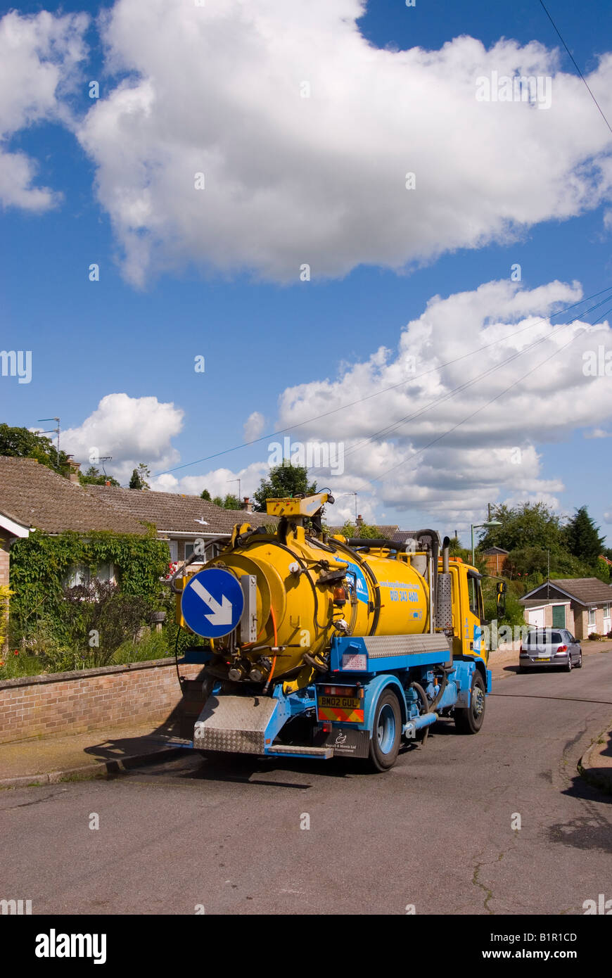Lorry Cleaning Out Drains On Street Stock Photo - Alamy