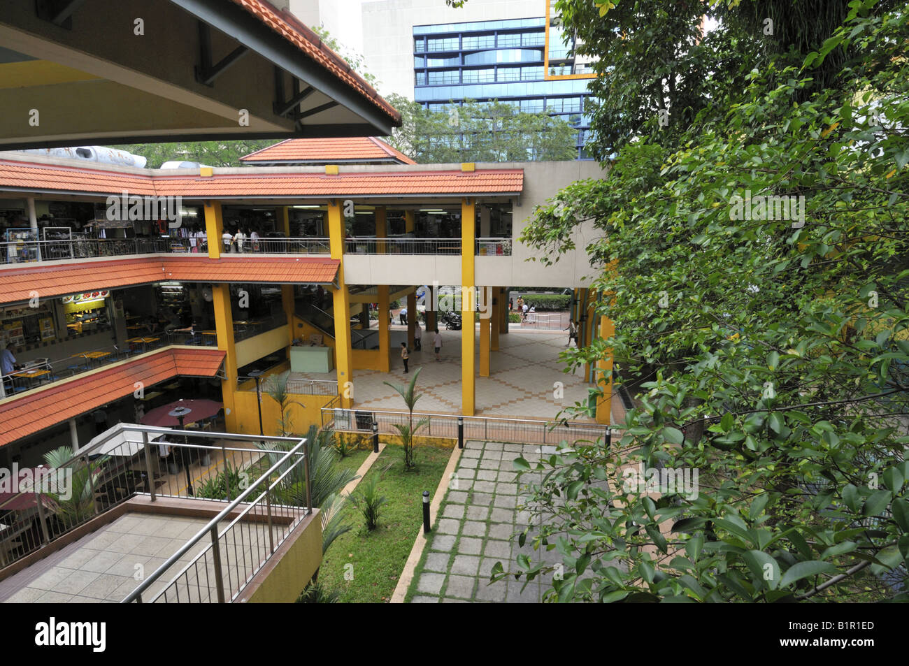 Shopping and food stall area at a Singapore public housing estate Stock ...