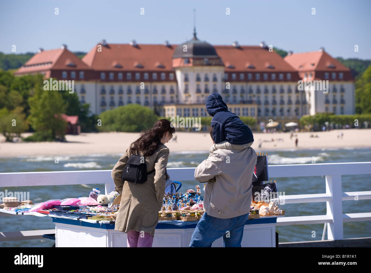 Souvenir stall selling amber and sea shells Grand Hotel in background ...