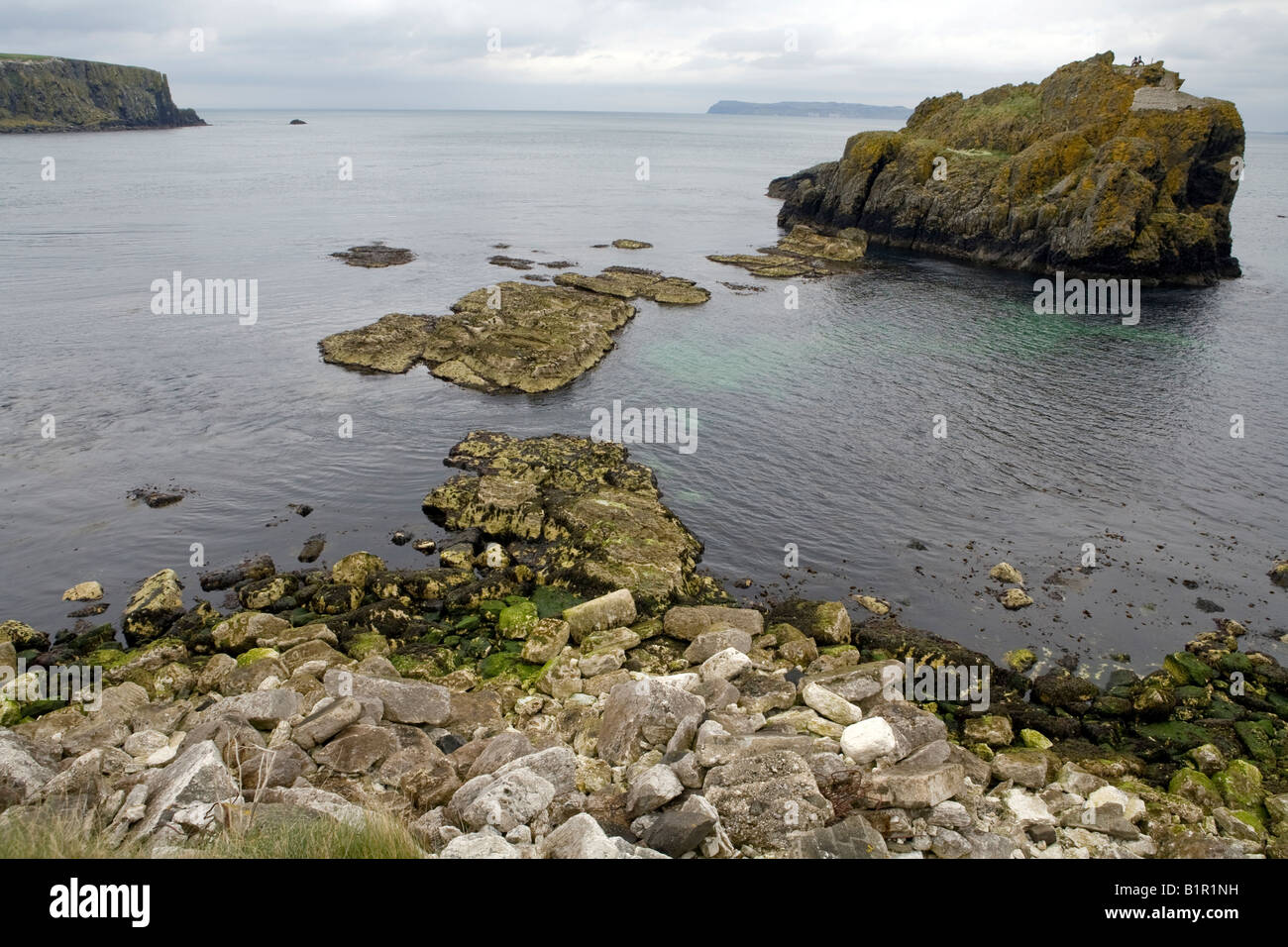 Cliff rope bridge sea tourists hi-res stock photography and images - Alamy