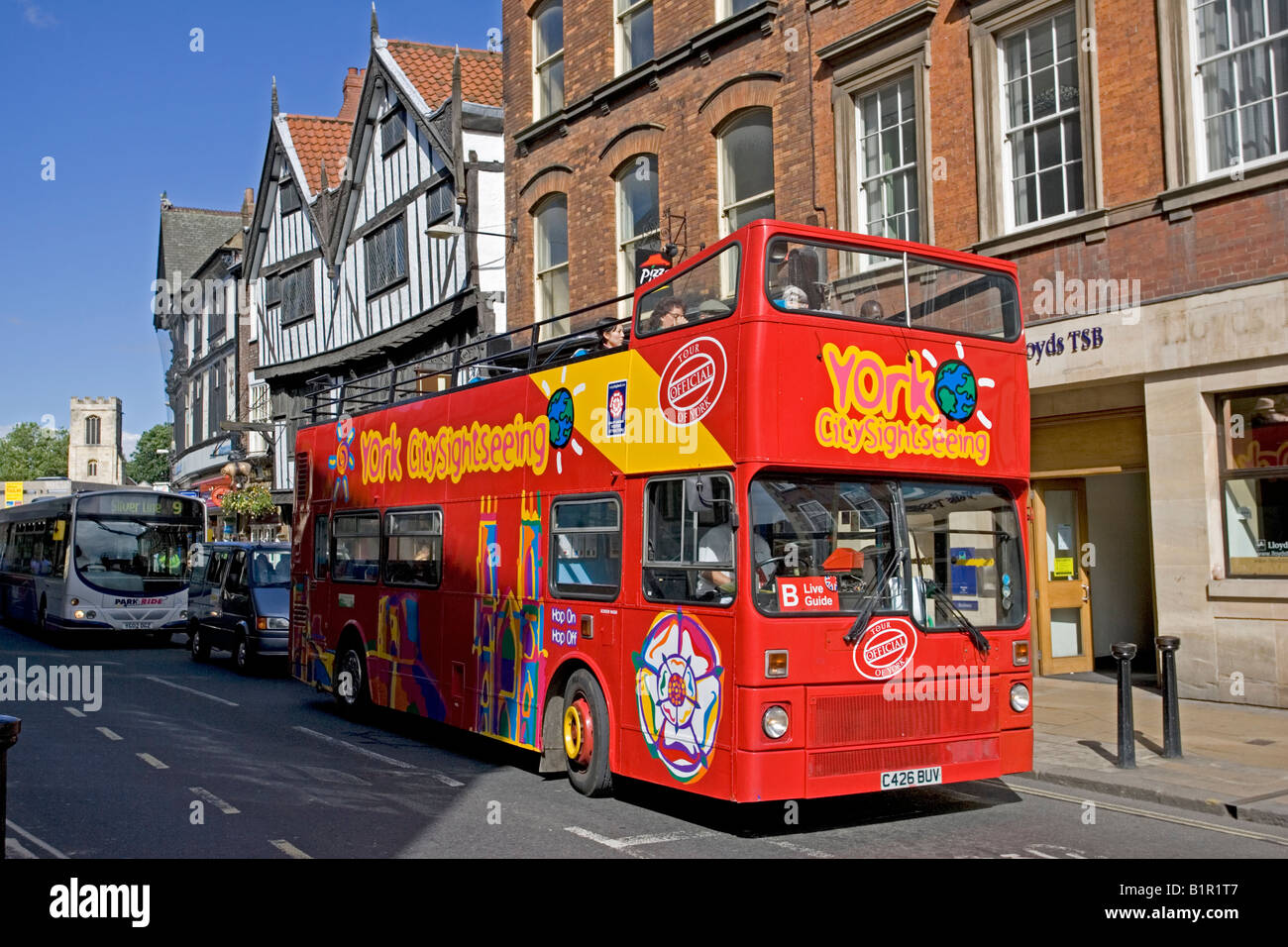 Open topped double decker red tour bus York UK Stock Photo - Alamy