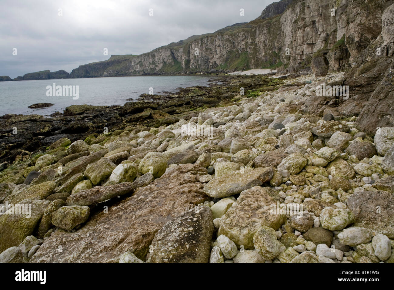 Cliff rope bridge sea tourists hi-res stock photography and images - Alamy