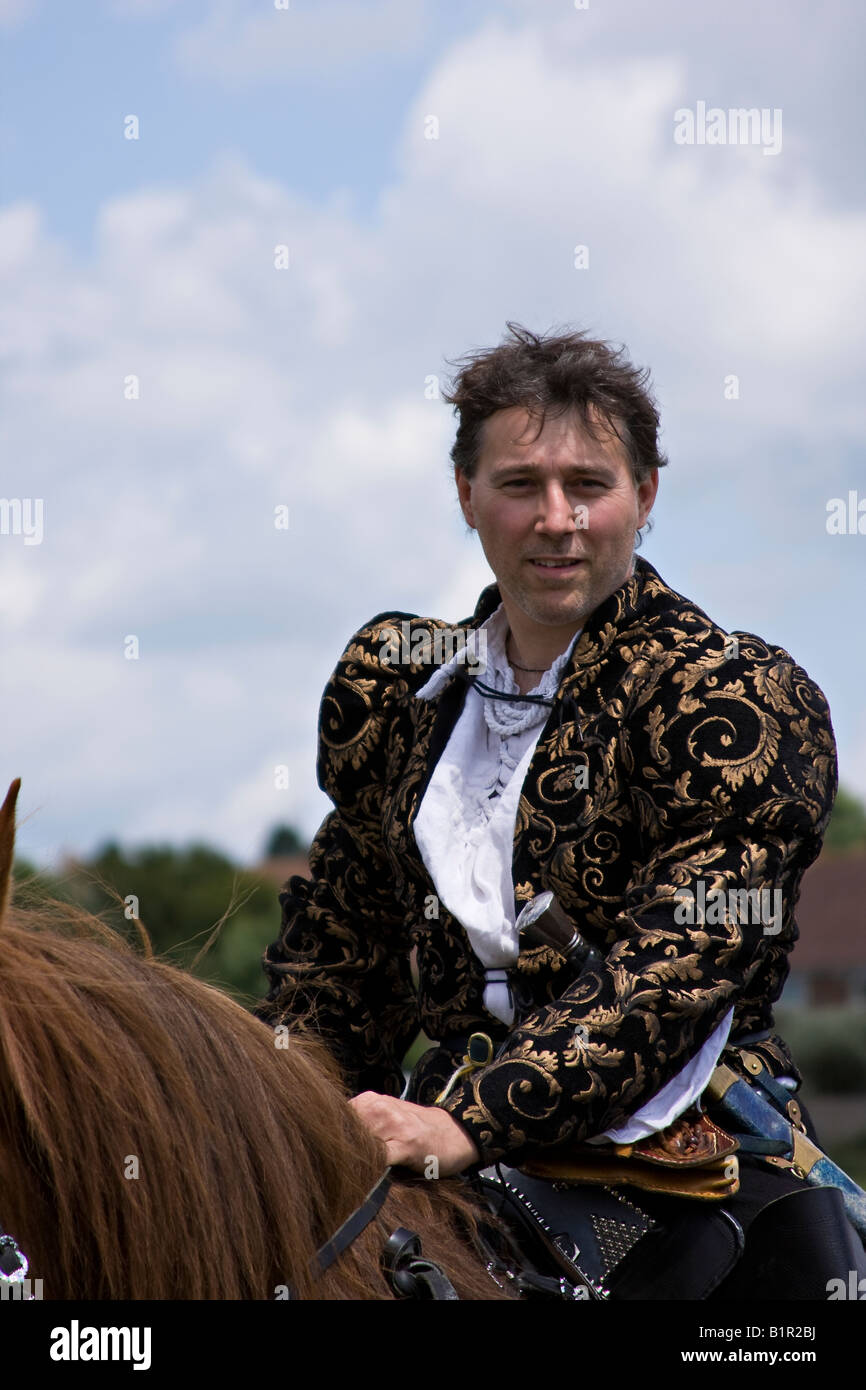 Man in medieval costume riding a horse, Sussex, England Stock Photo - Alamy