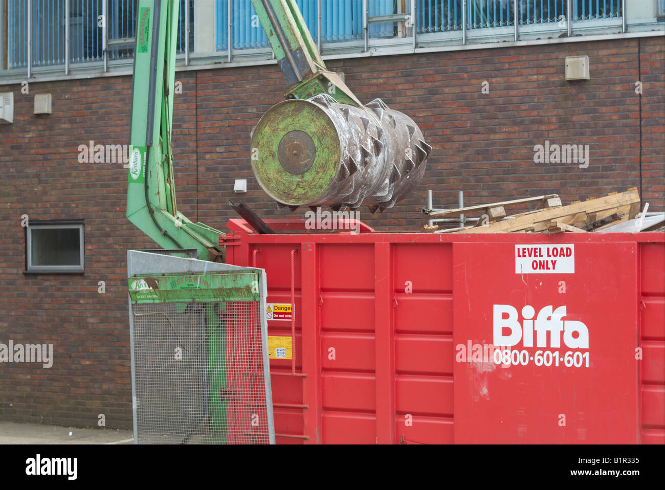 Waste compacter and Biffa container Stock Photo - Alamy