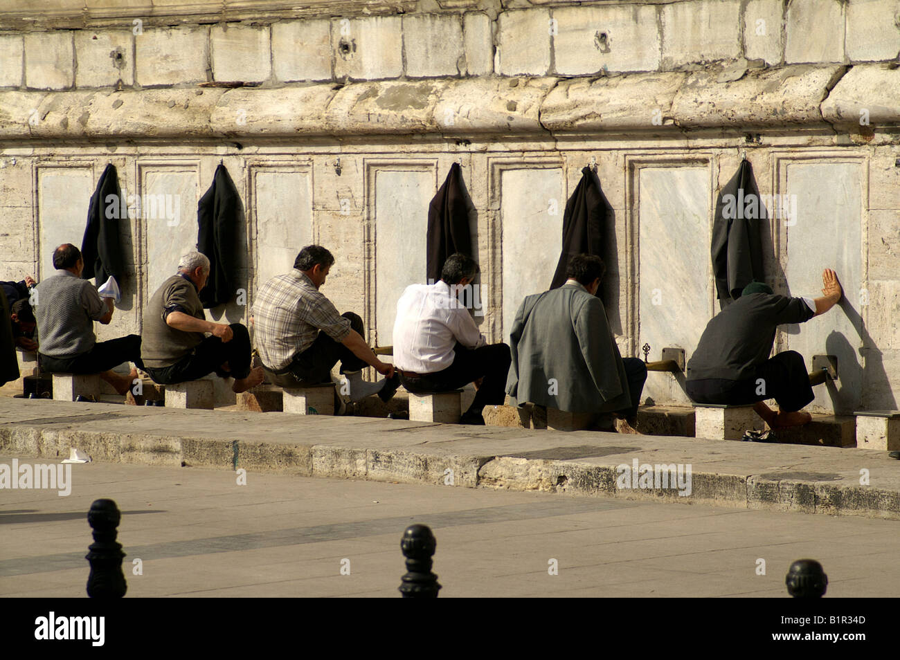 Washing feet ablutions at the New mosque Istanbul Turkey Stock Photo ...