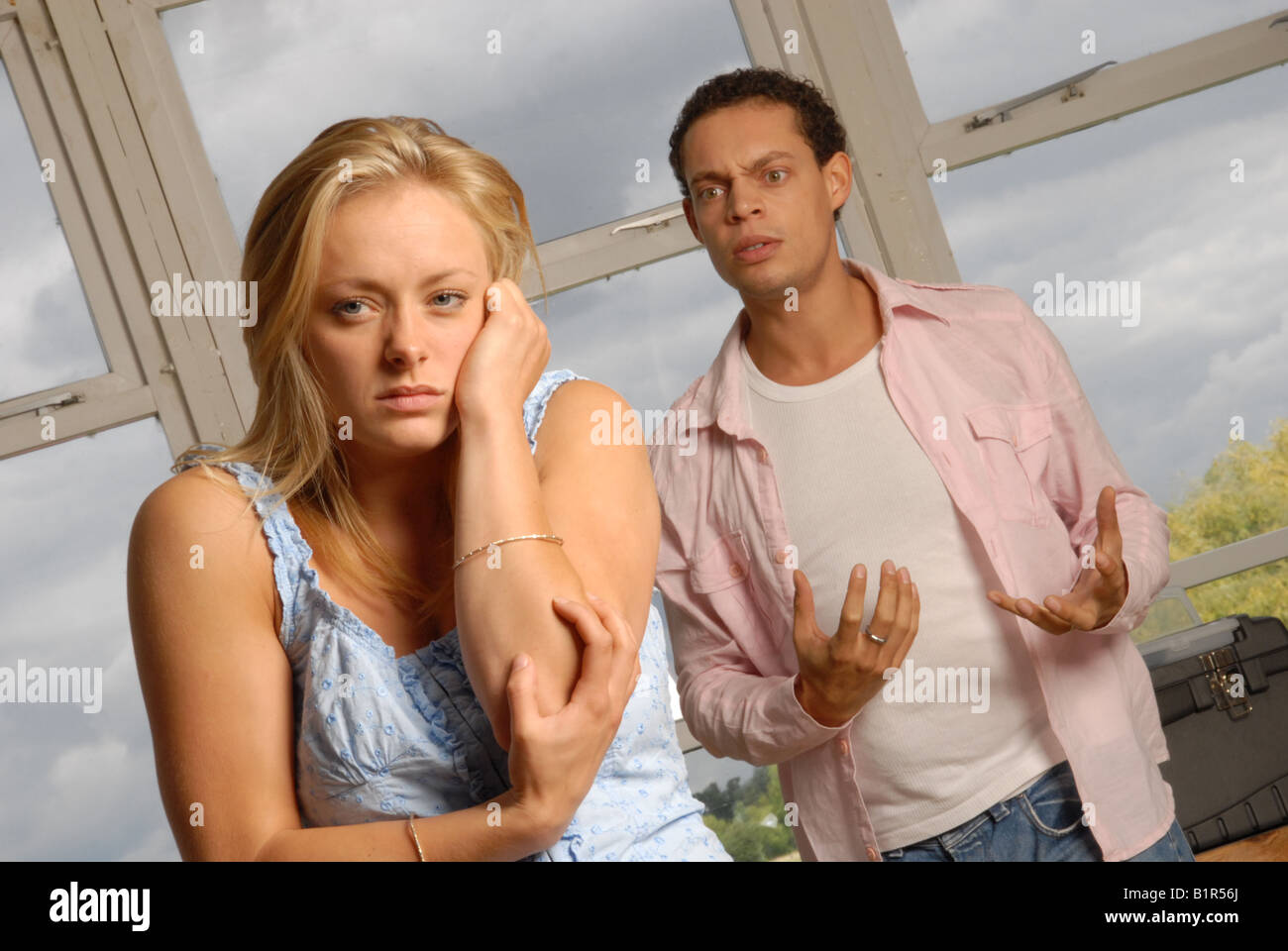 A young couple having a row Stock Photo - Alamy