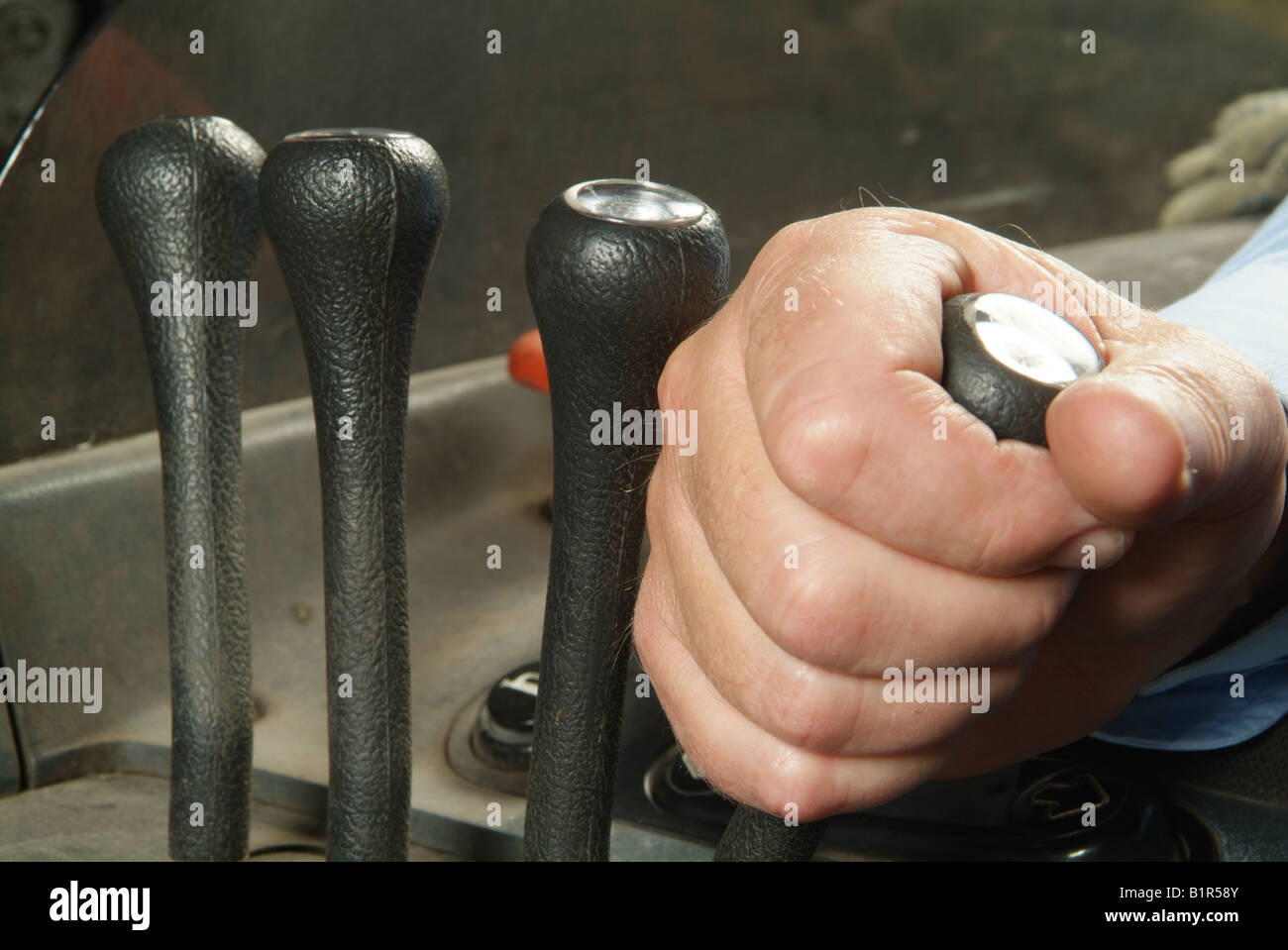 A man's hand on the controls of a fork-lift truck Stock Photo - Alamy