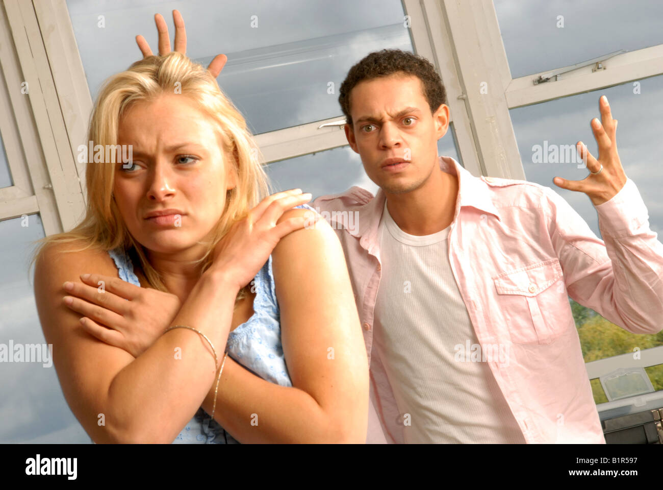 A young couple having a row Stock Photo - Alamy