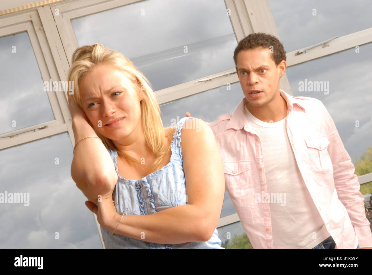 A young couple having a row Stock Photo - Alamy