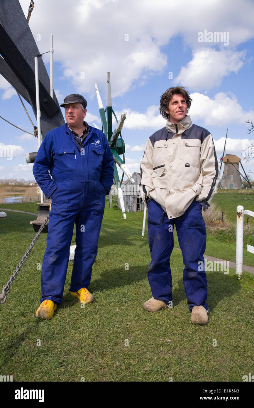 Windmill workers wearing clogs, at Kinderdijk, Holland Stock Photo - Alamy