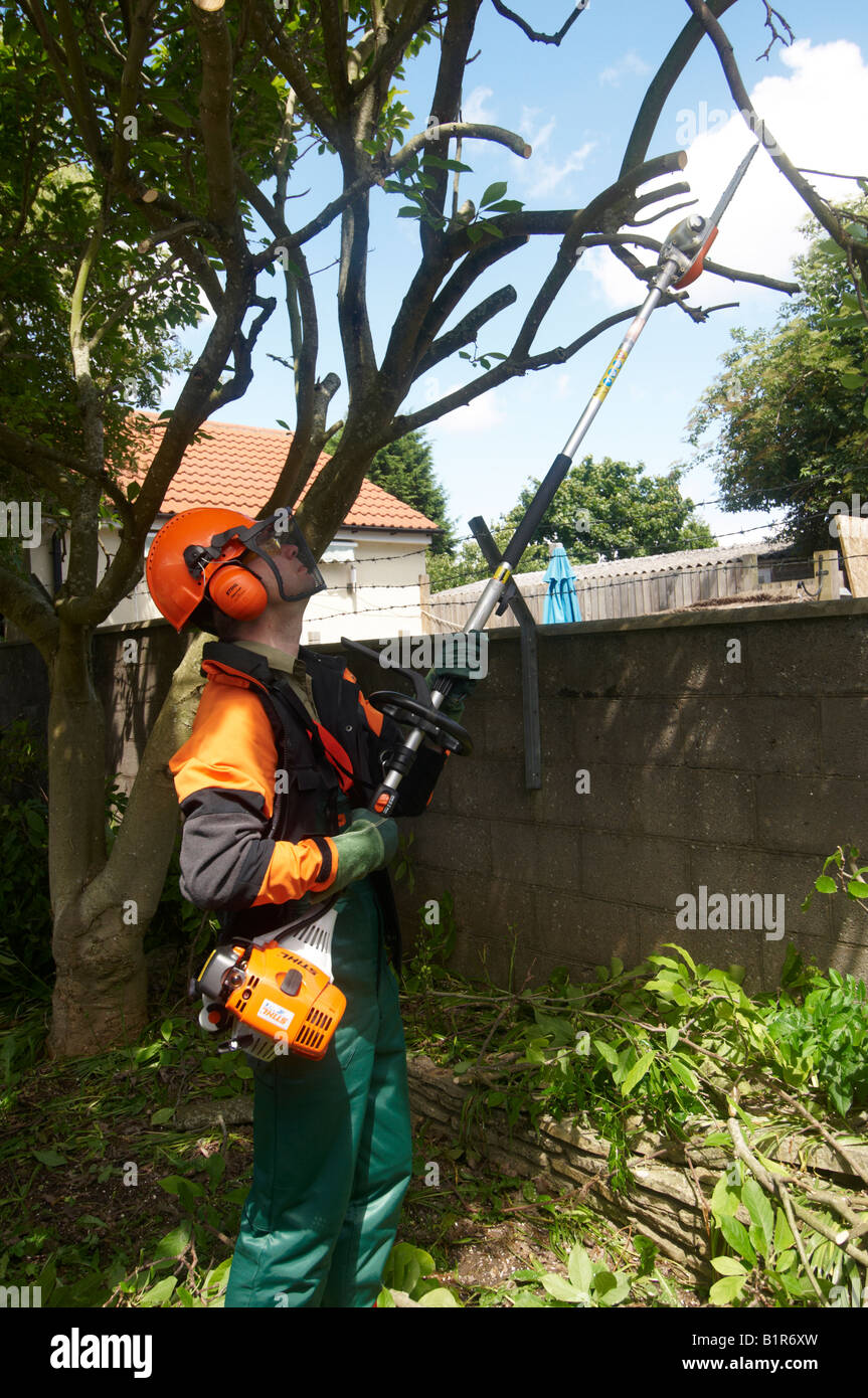 Man in full protective STIHL power tool clothing using a Combi Engine ...