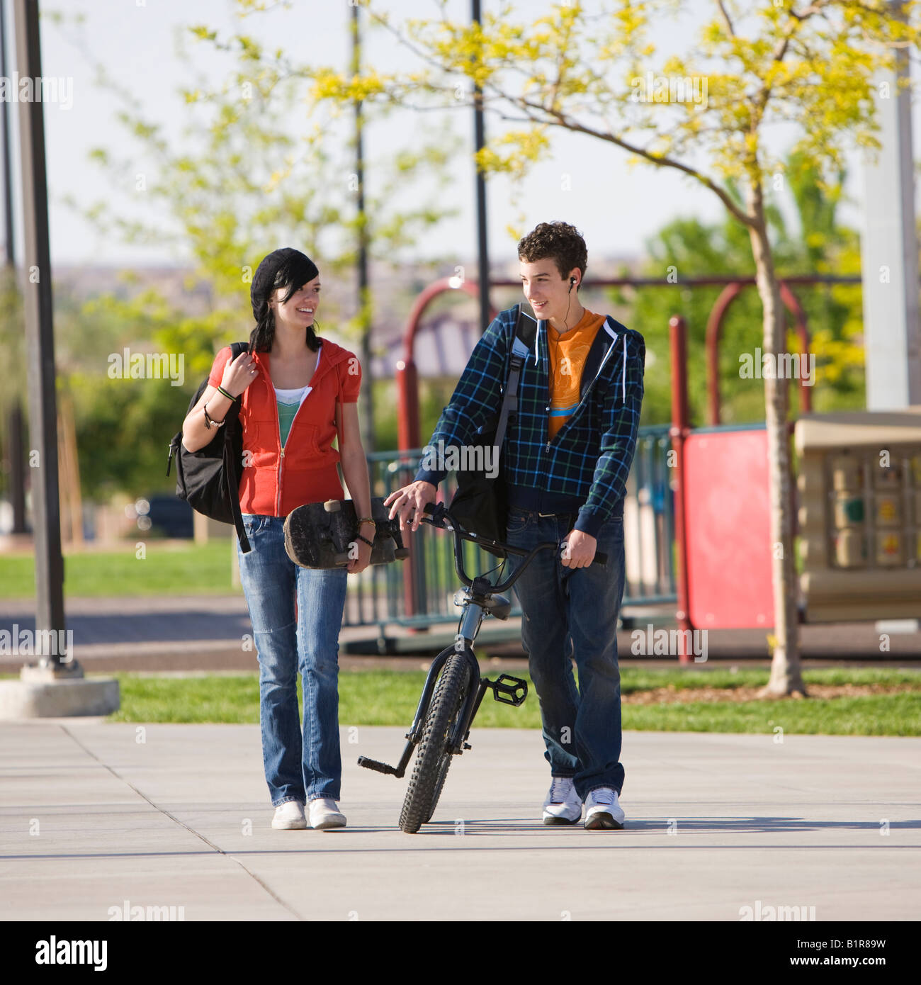 Two kids walk home Stock Photo - Alamy