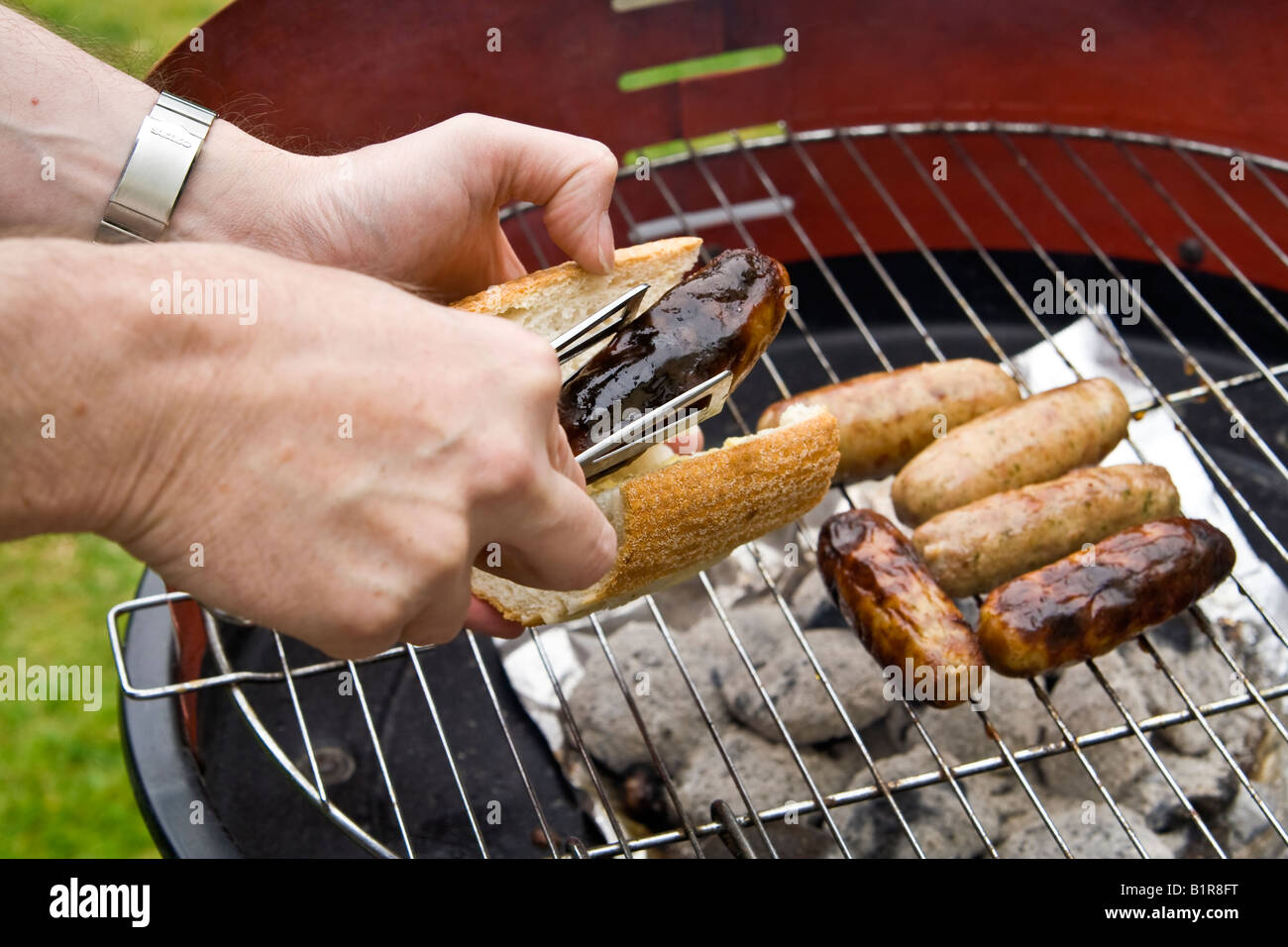 Man eating a sausage roll hi-res stock photography and images - Alamy