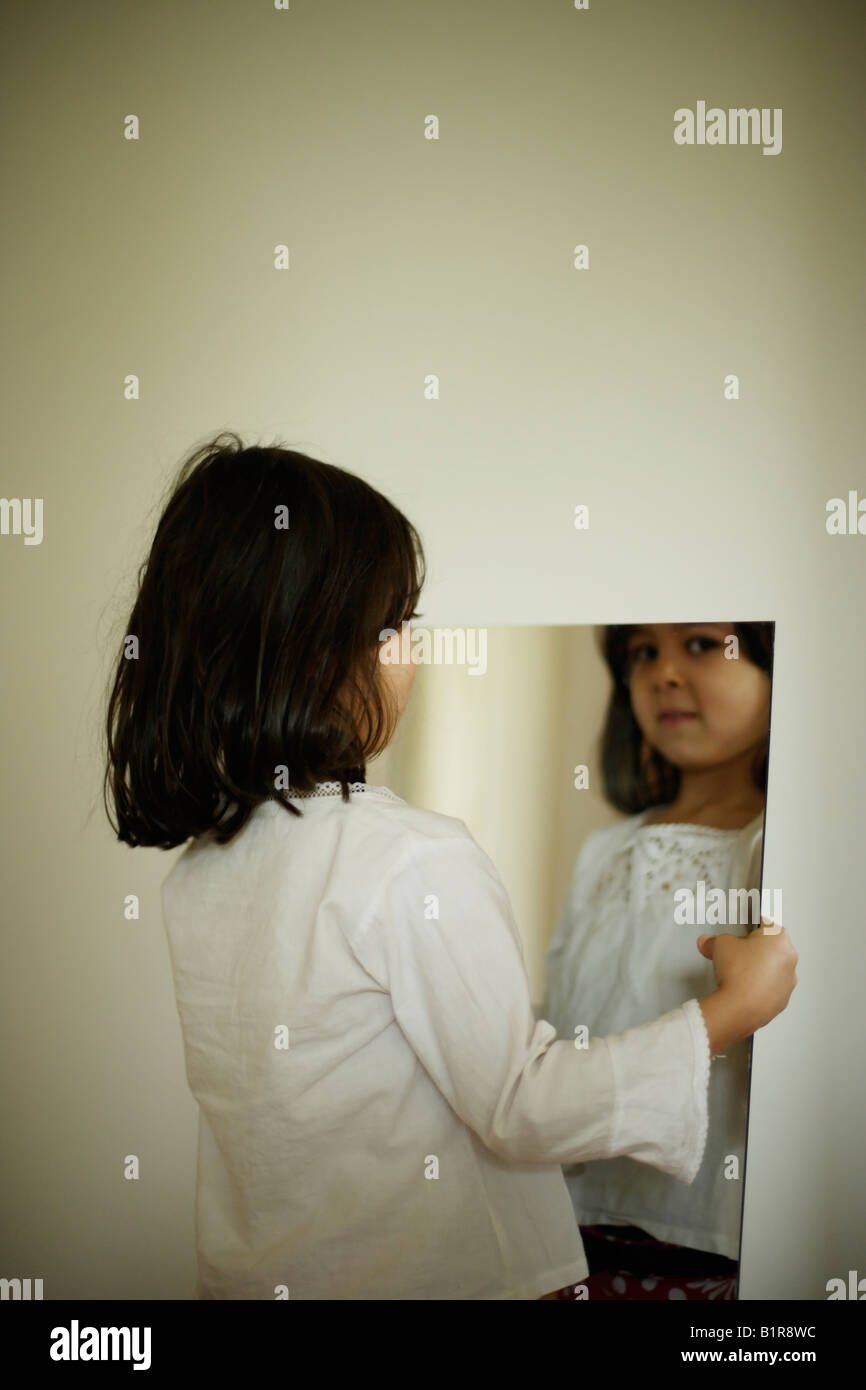 Child reflected in mirror Stock Photo - Alamy