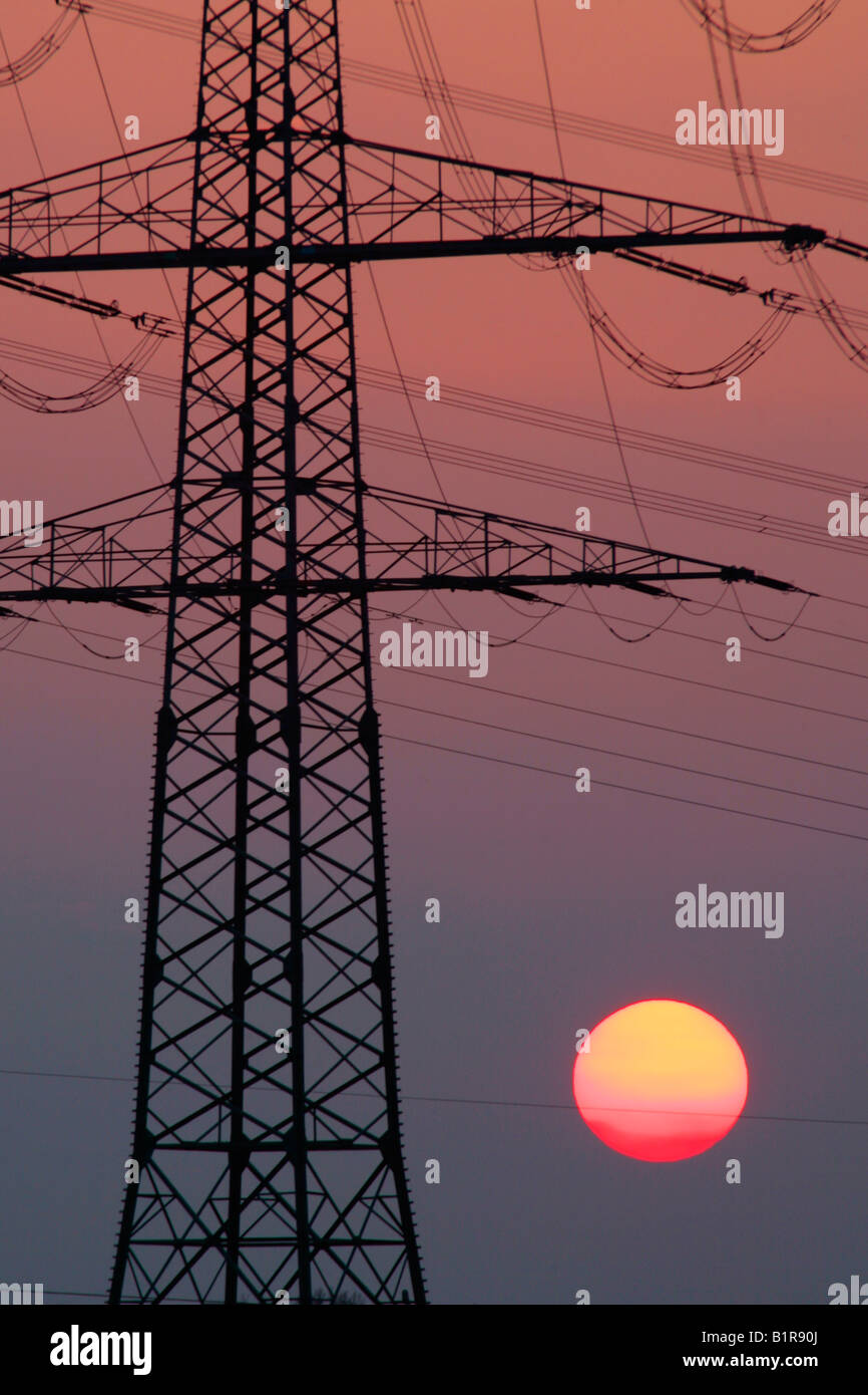 pylon in front of the setting sun Stock Photo - Alamy