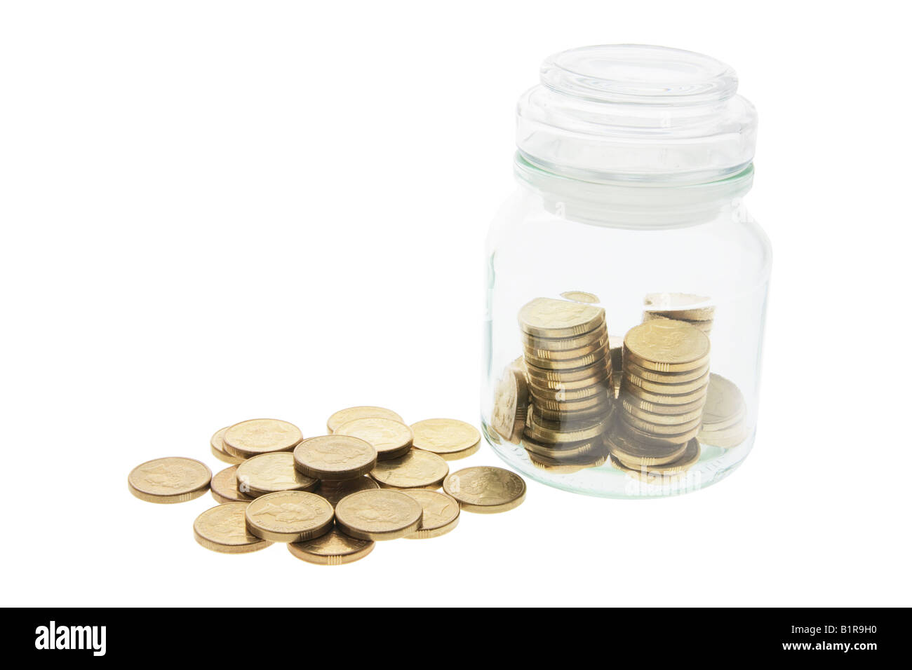Coins in Glass Jar Stock Photo - Alamy