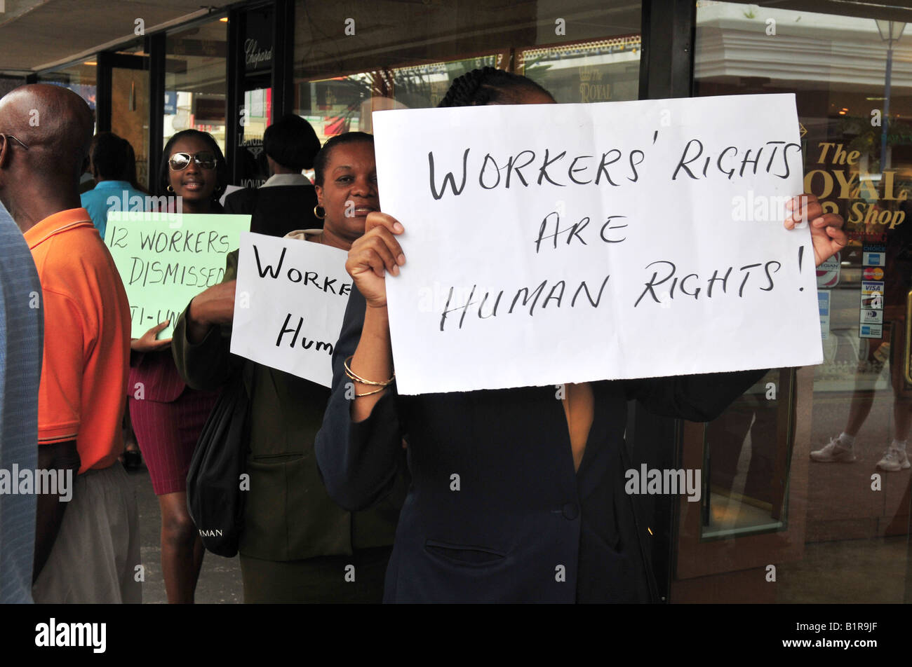 Workers strike action outside The Royal Store in Bridgetown Barbados ...