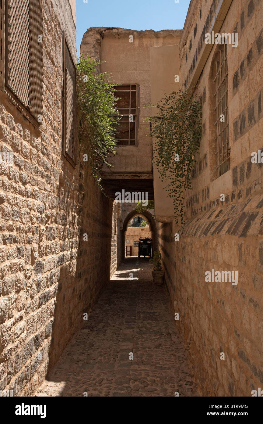 Hama Syria ancient back street tower house Stock Photo - Alamy