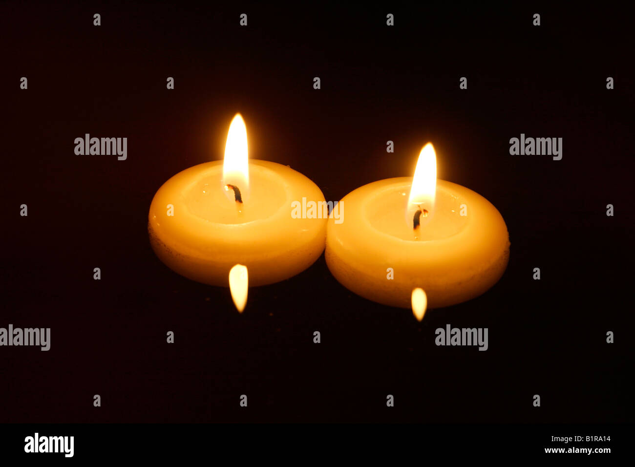 two floating candles Stock Photo - Alamy