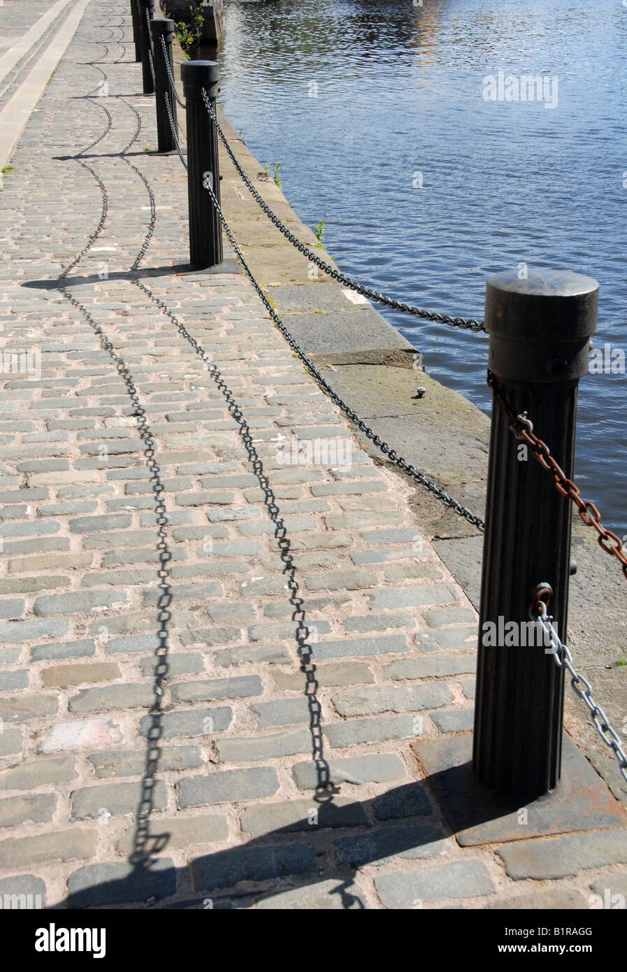 Chain link fence shadows Stock Photo - Alamy