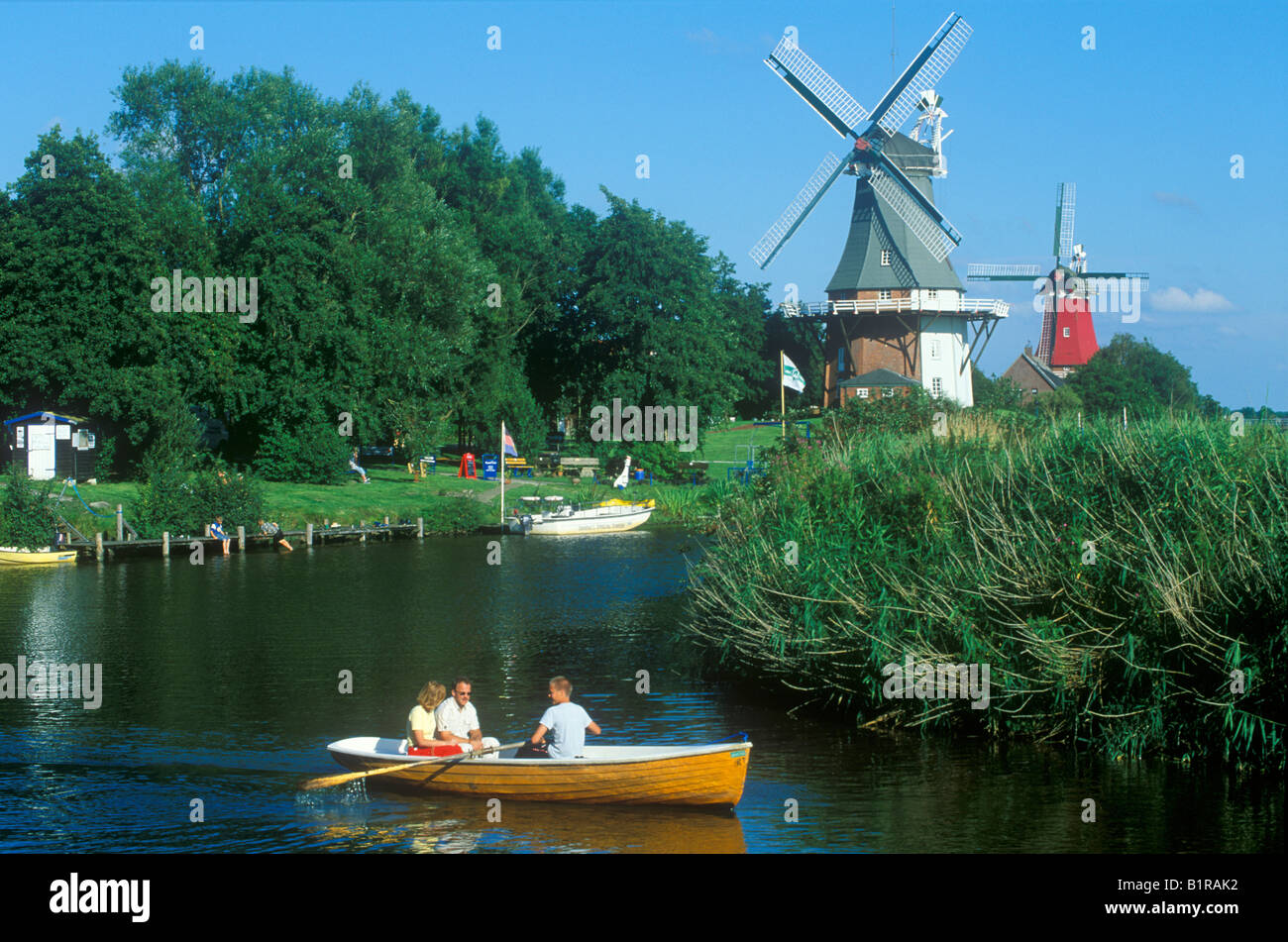 Row of seaside windmills hi-res stock photography and images - Alamy
