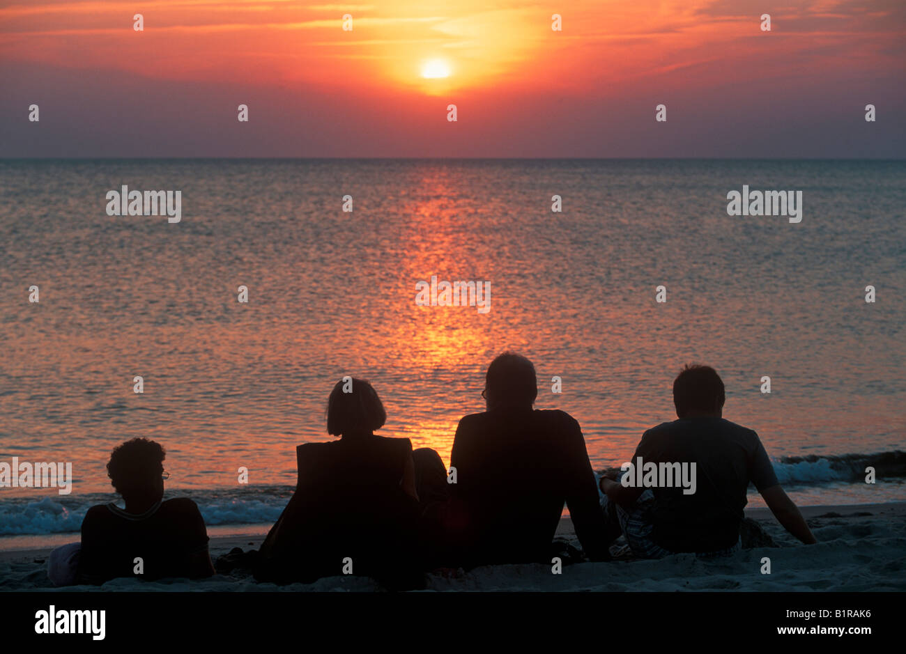people enjoying the sunset near Hoernum on Sylt Island in Northern ...