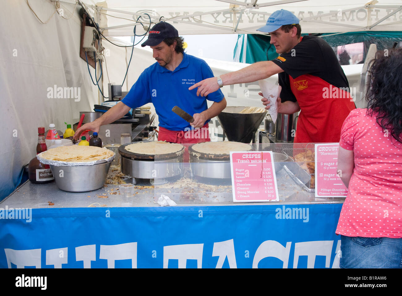 Traditonal French crepes being made at an open air food market in ...