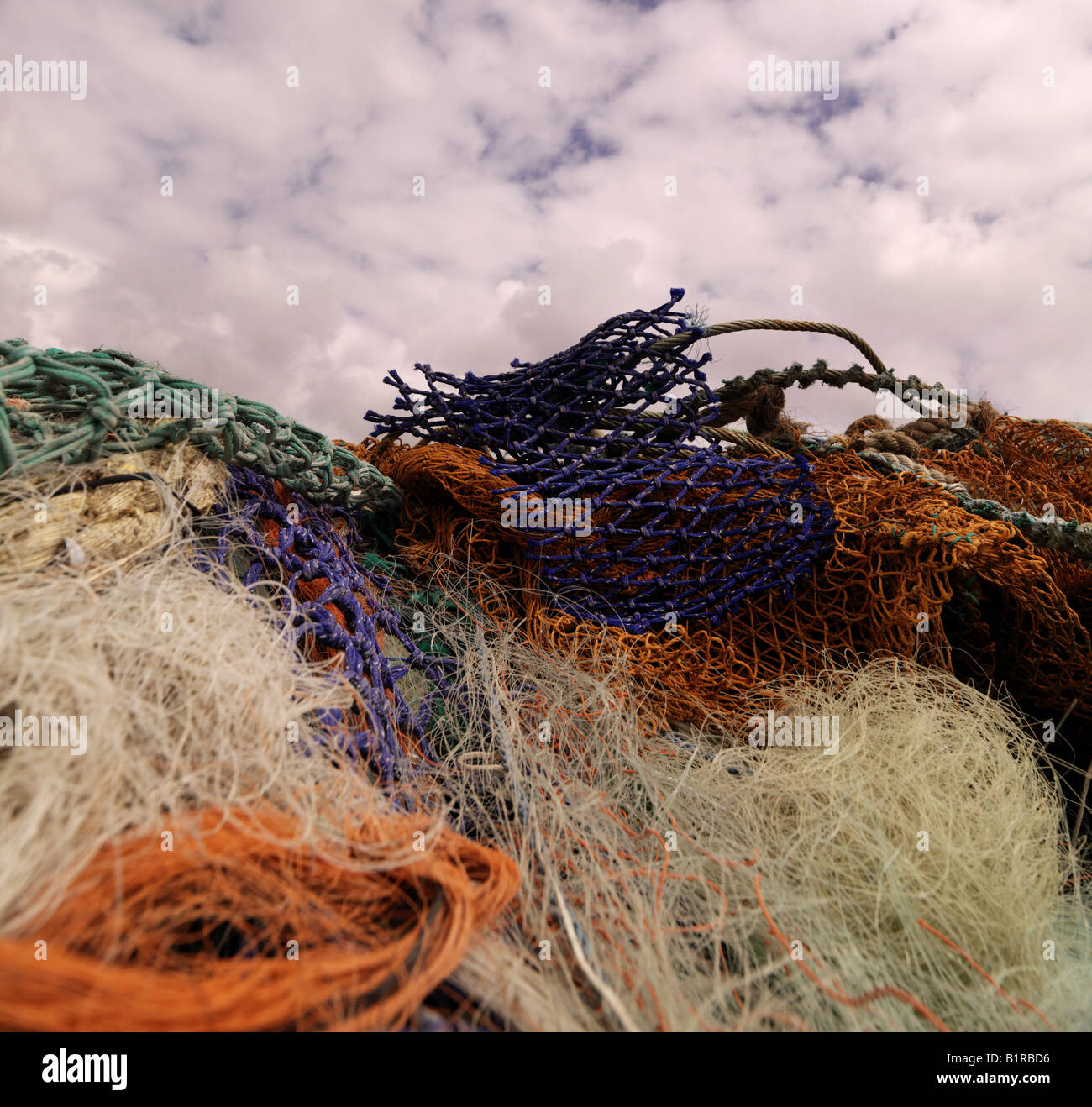 Multi coloured fishing nets in Padstow harbour, Cornwall, Devon UK ...