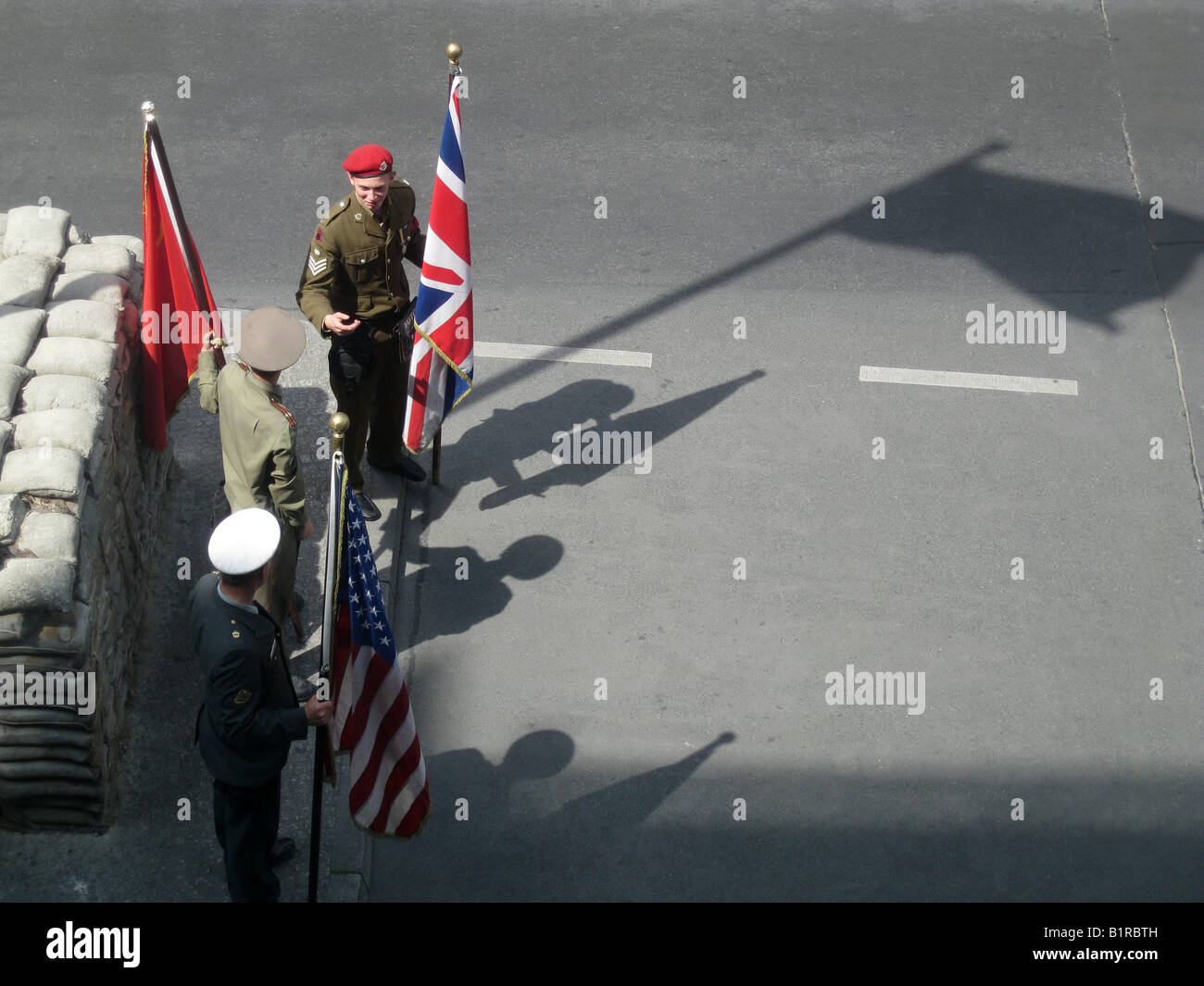 Actors portraying soldiers of the Western Allies at the former border ...