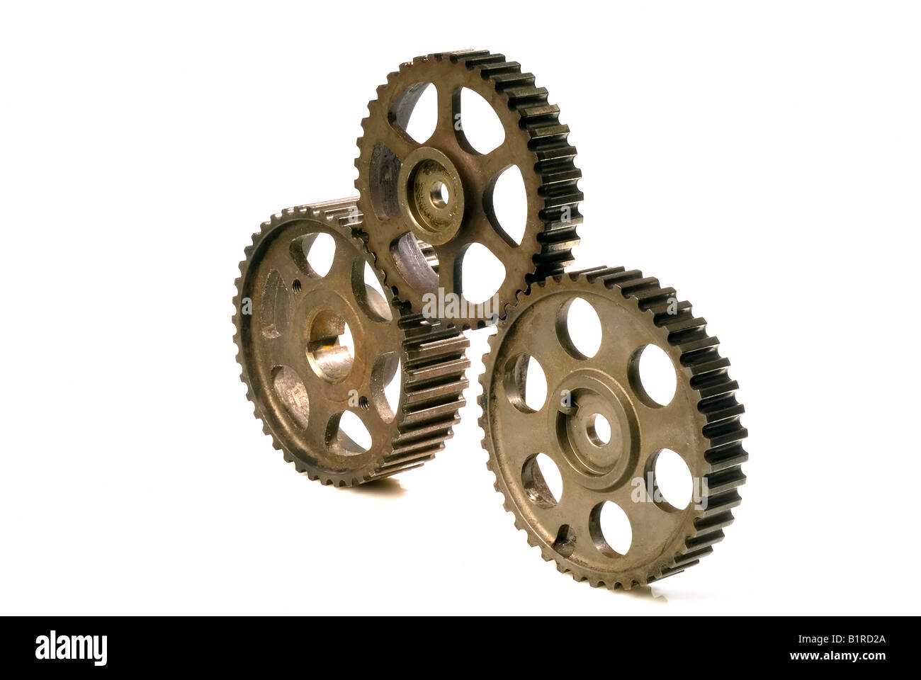 four cogwheels isolated on white Stock Photo - Alamy