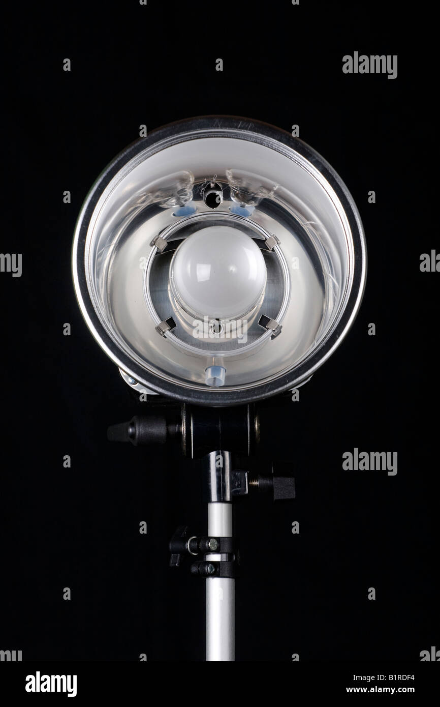 An Alienbees studio flash head with its reflector Stock Photo - Alamy