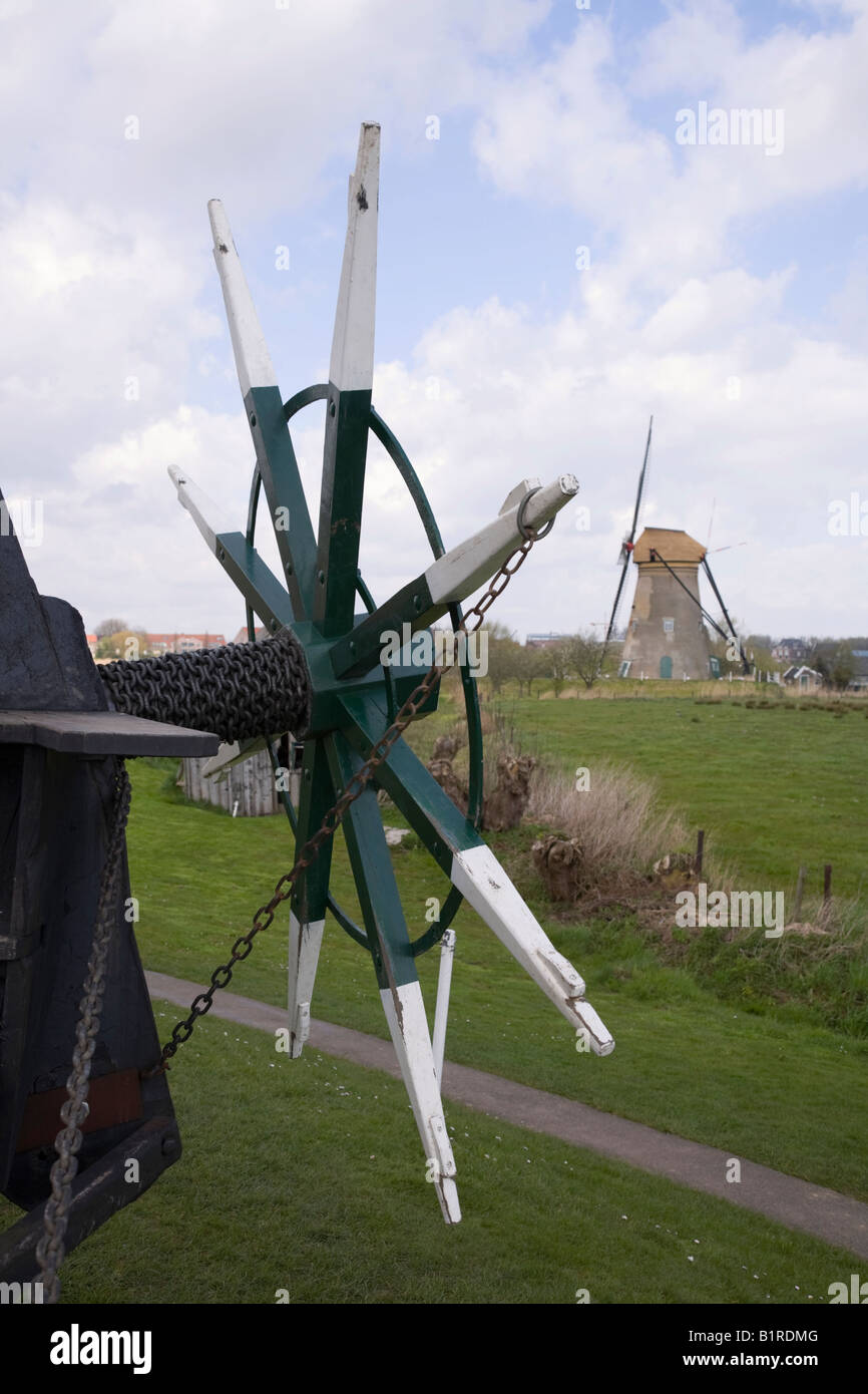 The winding mechanism and pulley chain for turning a windmill into the ...