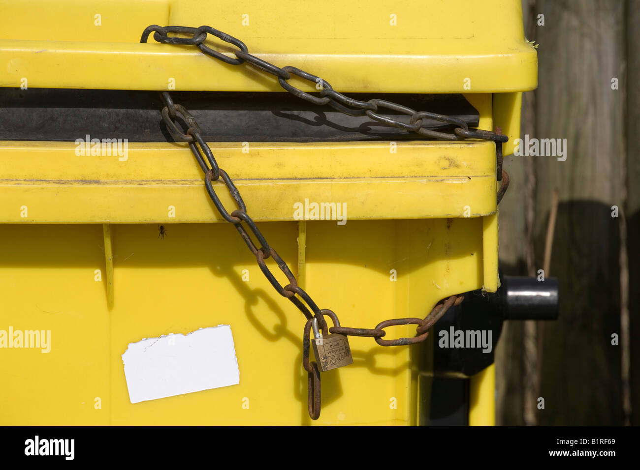 Rubbish container locked with a padlock and chain, Germany, Europe ...