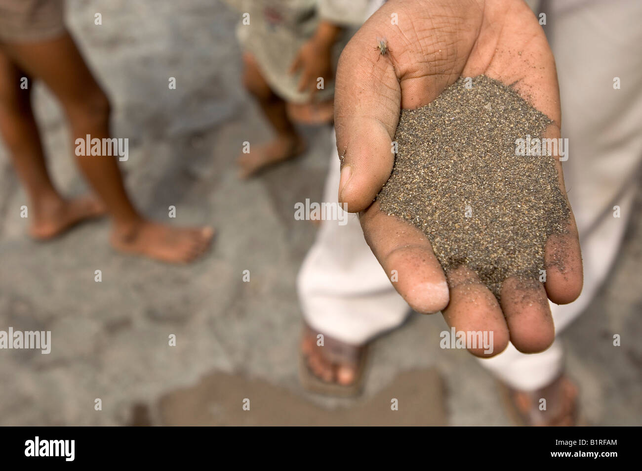 Copper shavings washed by hand from toxic industrial slag, earning a ...