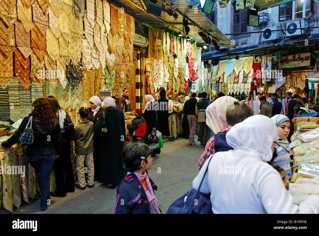 Shopping in the Material and clothing in the souk, Aleppo Bazaar ...