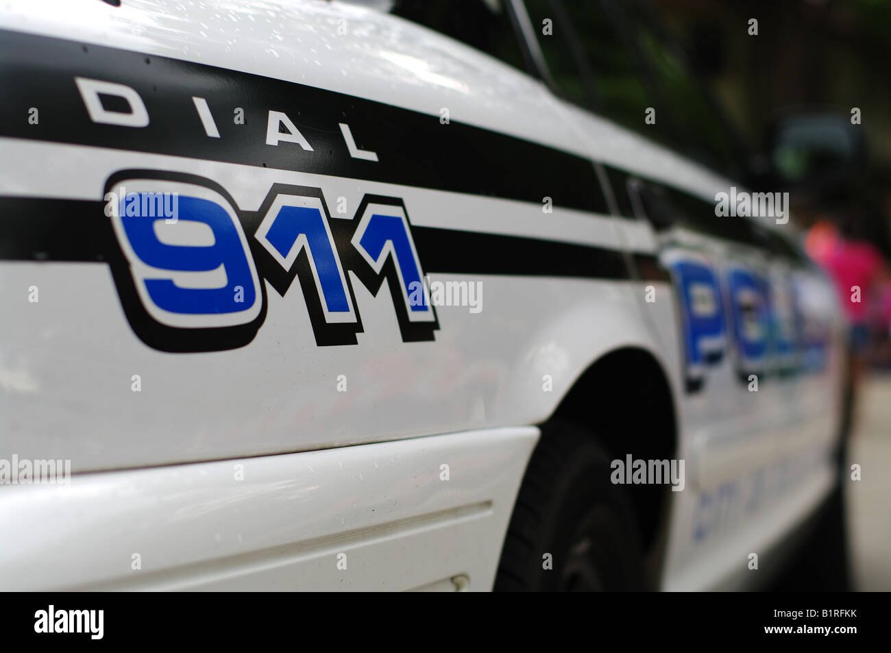 Dial 911 on side of a police car, cruiser Stock Photo - Alamy