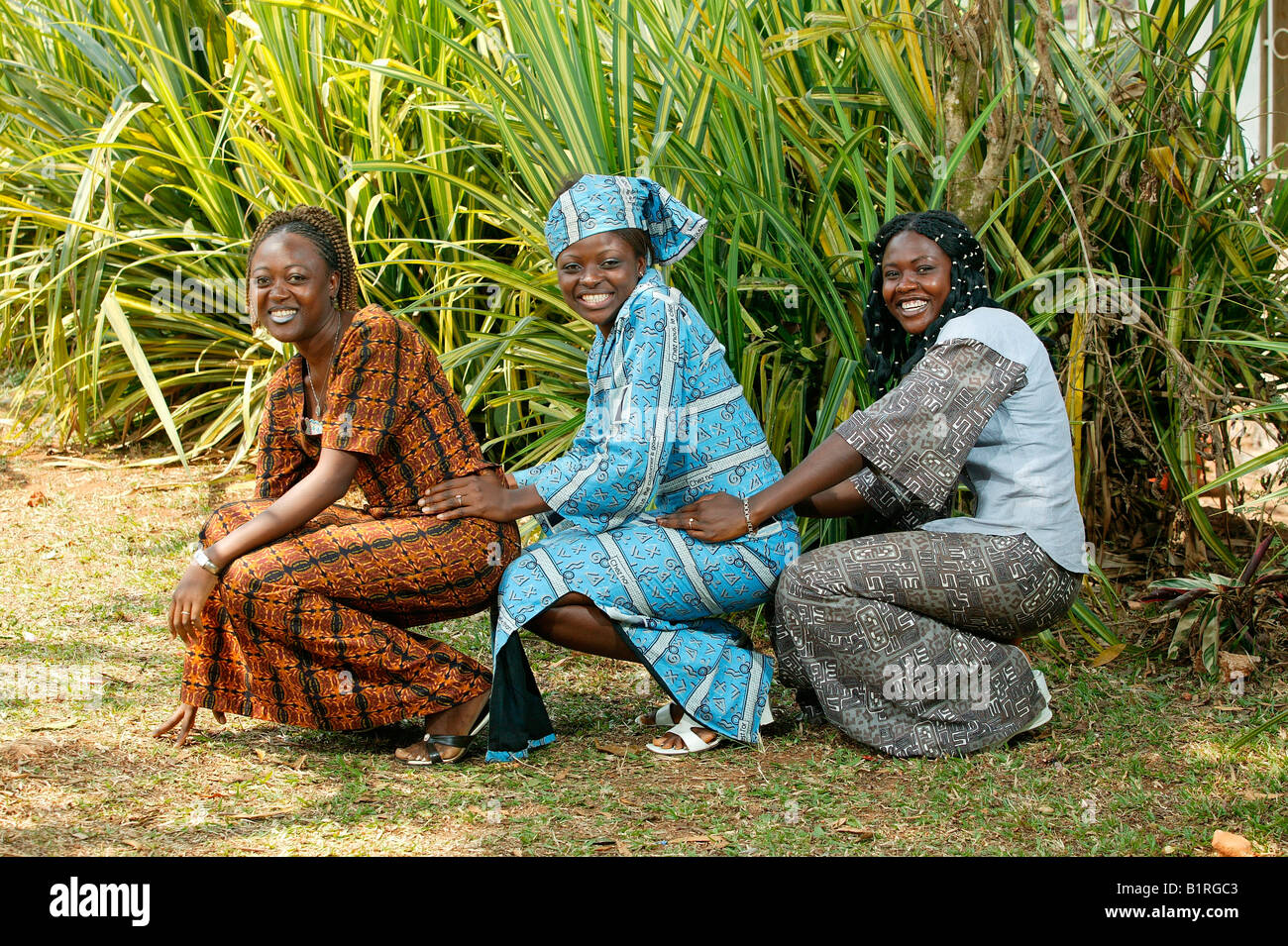 Tailors and seamstresses of an HIV help group modelling self-made ...
